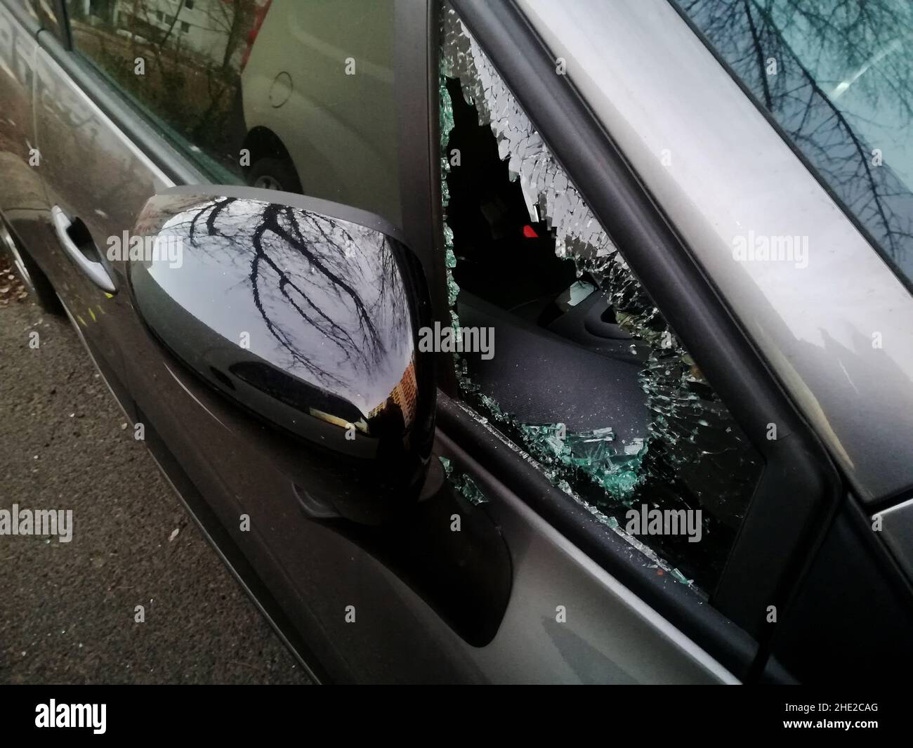 a broken triangular window from my car. they tried to steal my radio ...