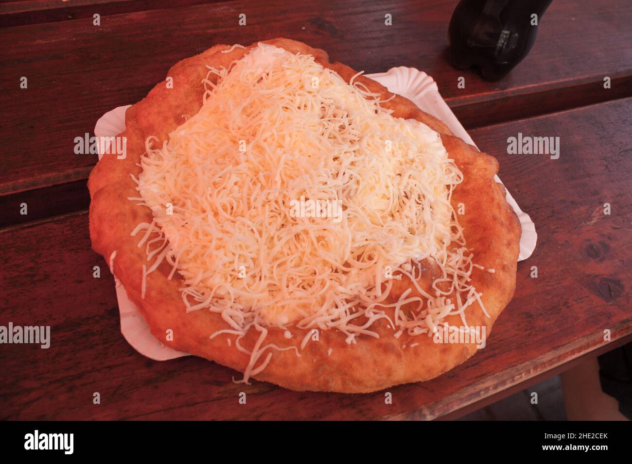 Langos with cheese and sour cream hi-res stock photography and images ...