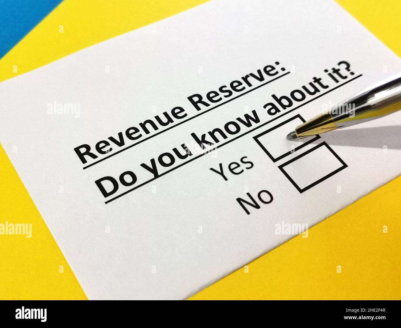 One person is answering question about revenue reserve Stock Photo - Alamy