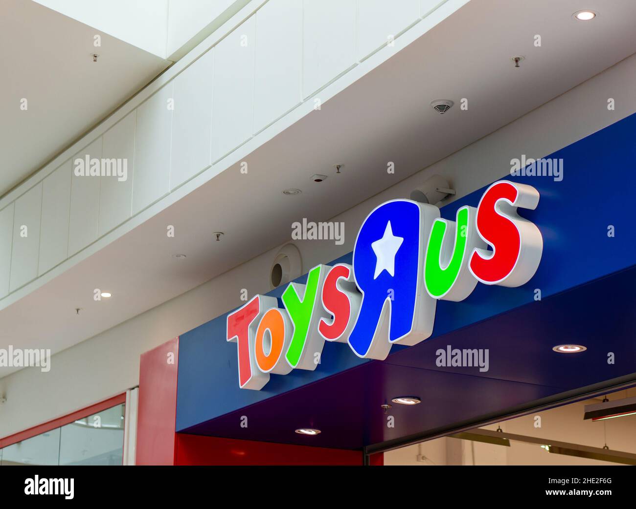 Closeup of Toys R Us brand logo in the front of a large toy store in ...