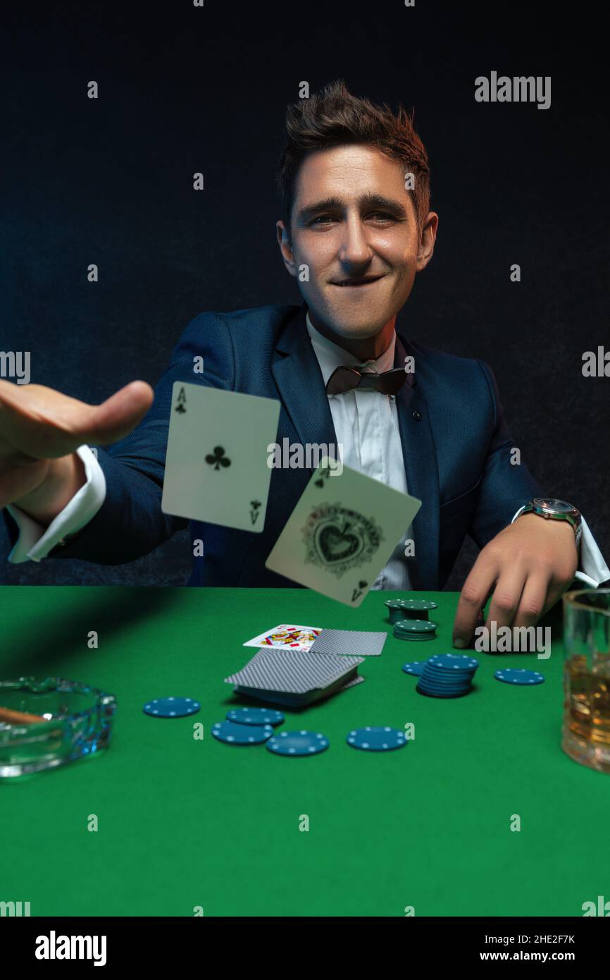 Happy rich man throwing money hi-res stock photography and images - Alamy
