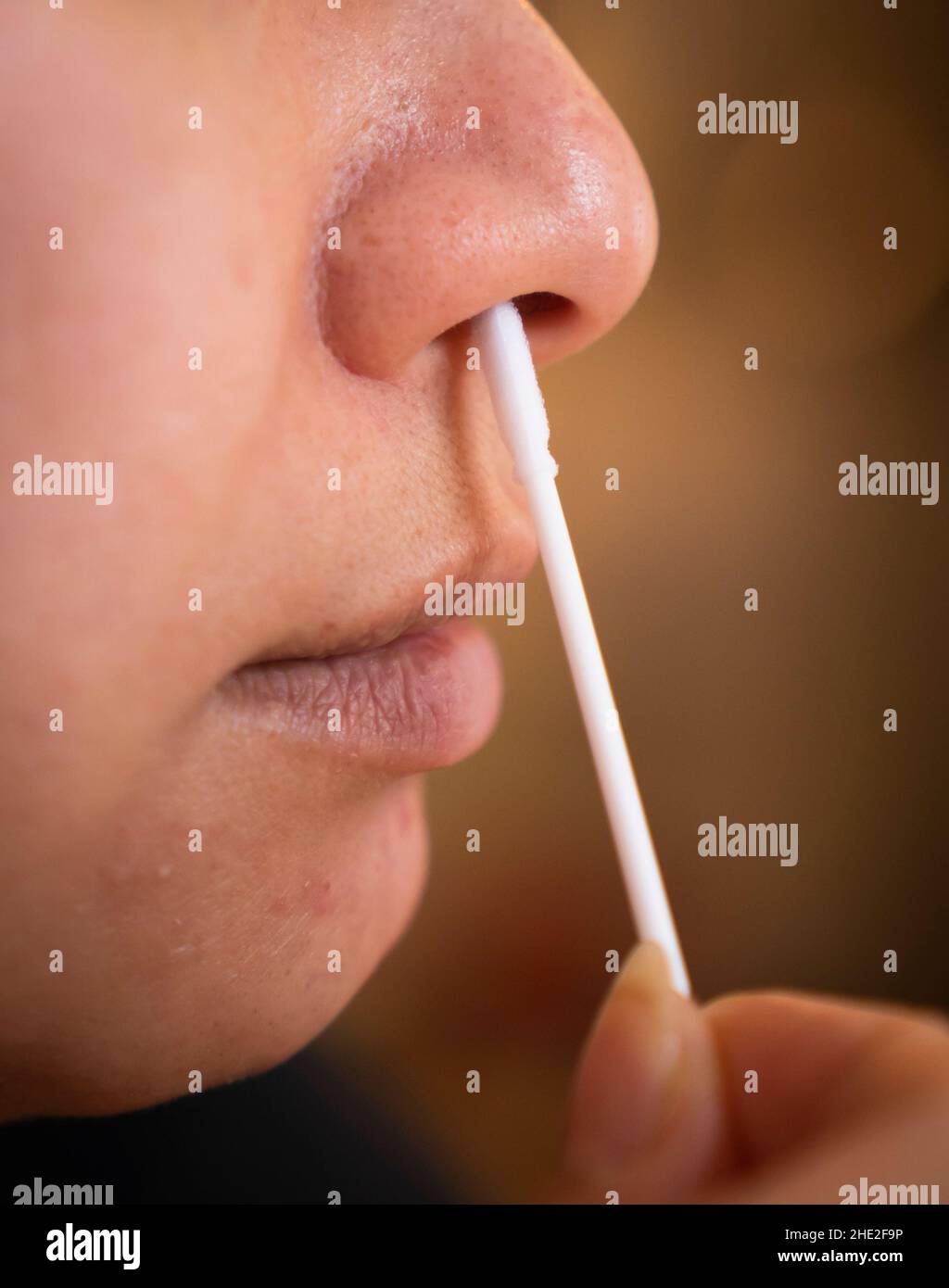 PICTURE POSED BY MODEL A person taking a Covid 19 lateral flow test ...