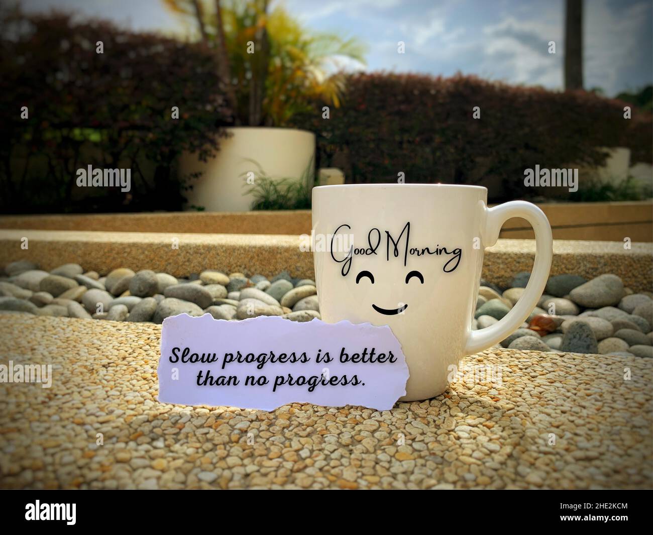 Motivational and inpirational quotes on a rip paper - slow progress is ...