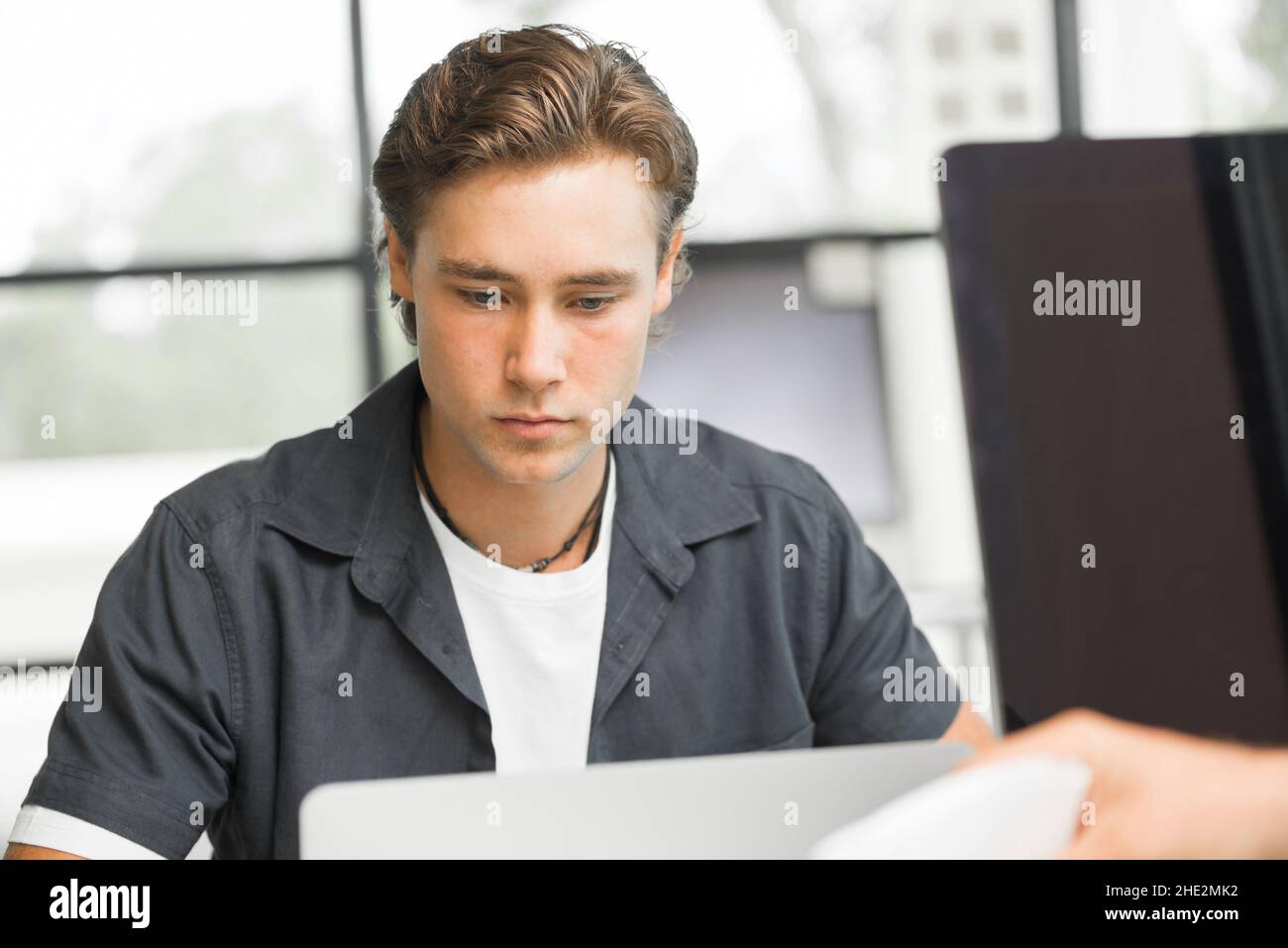 Handsome guy at computer work Stock Photo - Alamy