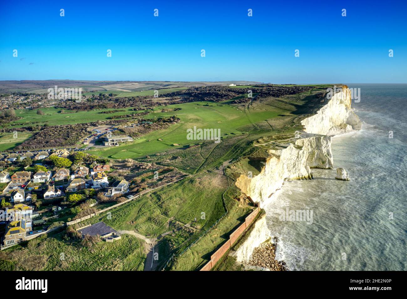 The white chalk cliffs at Seaford Head in East Sussex with the Golf ...