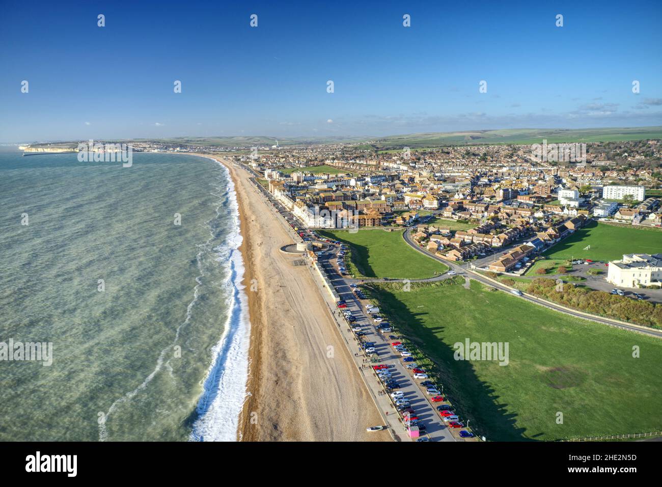 Aerial photo along the wide shingle beach at Seaford, a popular tourist ...