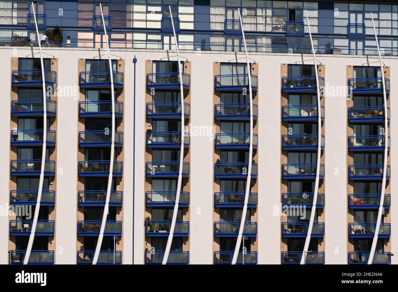 London, England - June 2021: Rows of balconies on an apartment block ...