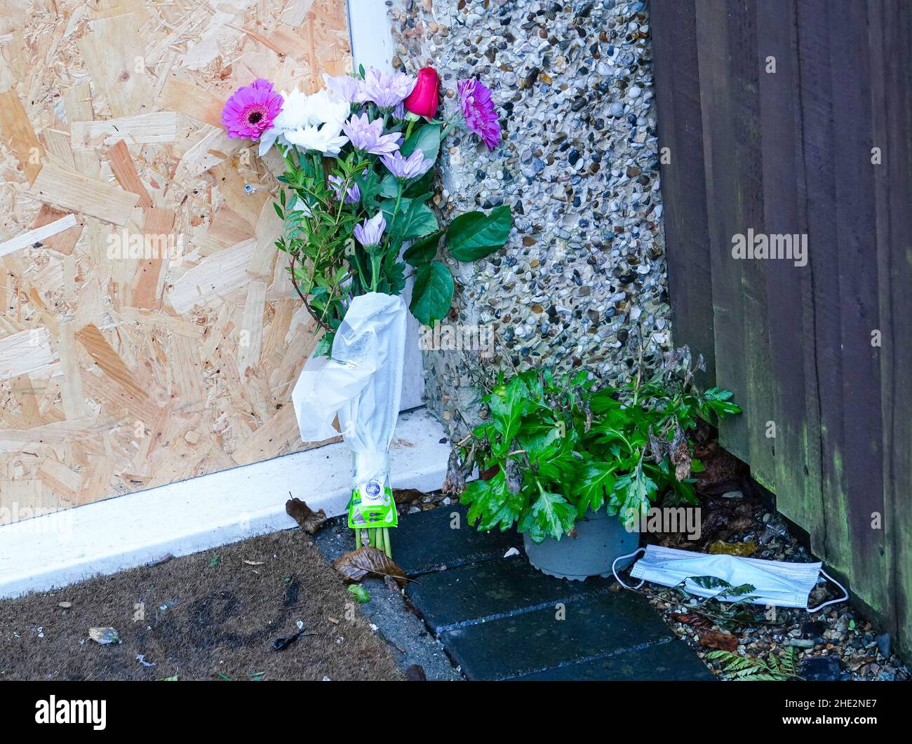 Flowers outside a house in Queens Park Road in Romford where Josephine ...