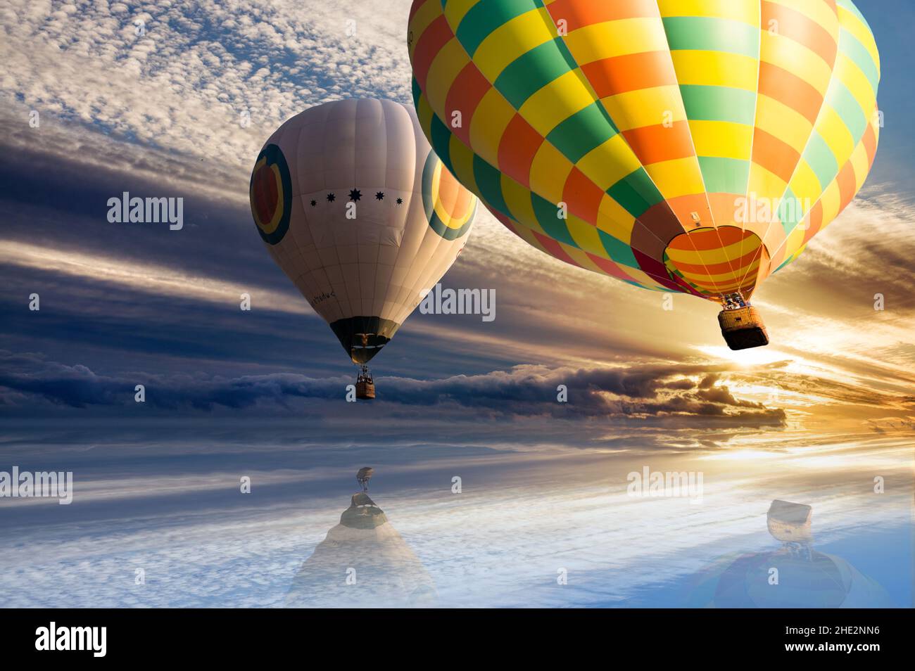 Fantasy balloon over blue water surface Stock Photo - Alamy