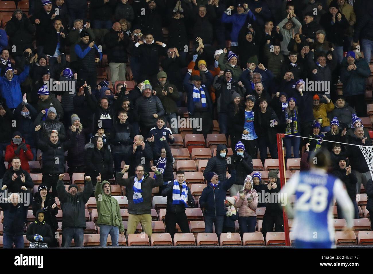 Barrow fans celebrate after Ollie Banks scored their side's first goal ...