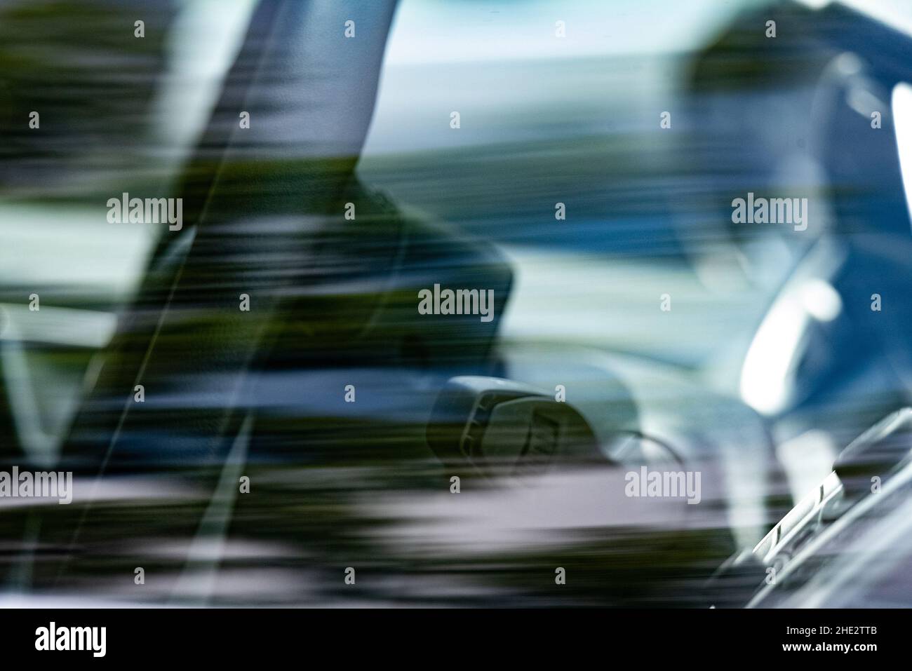 Hot car interior. Passenger car dashboard view through the side window ...