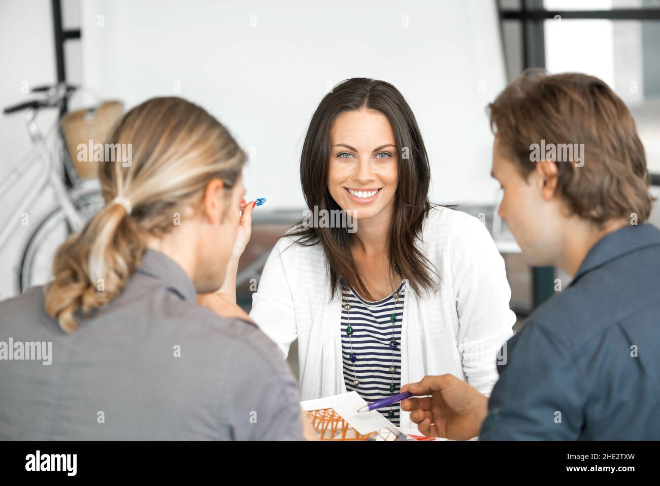 Working in cooperation Stock Photo - Alamy