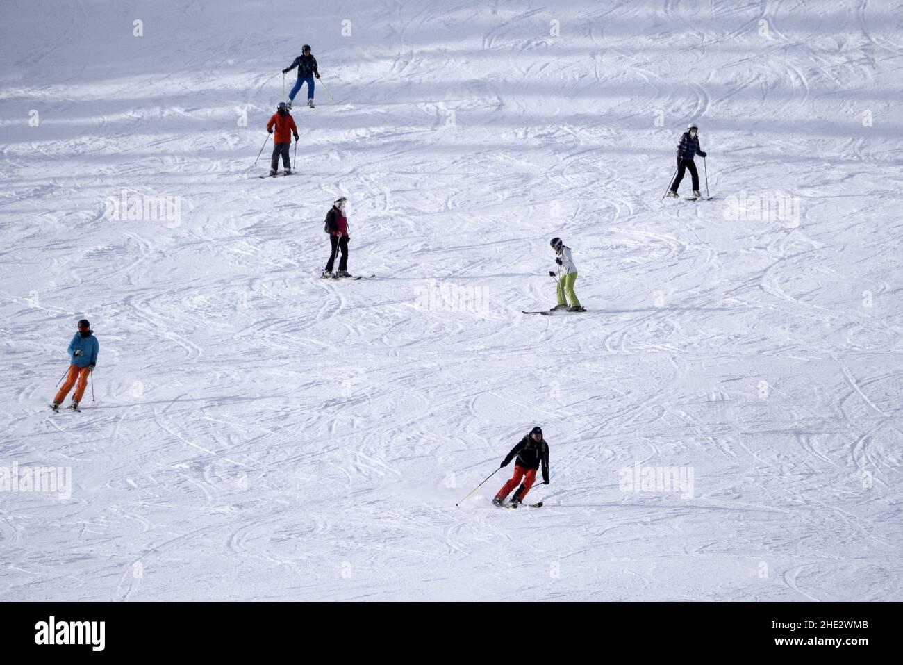 many skiers skiing in dolomites gardena valley snowy mountains Stock ...