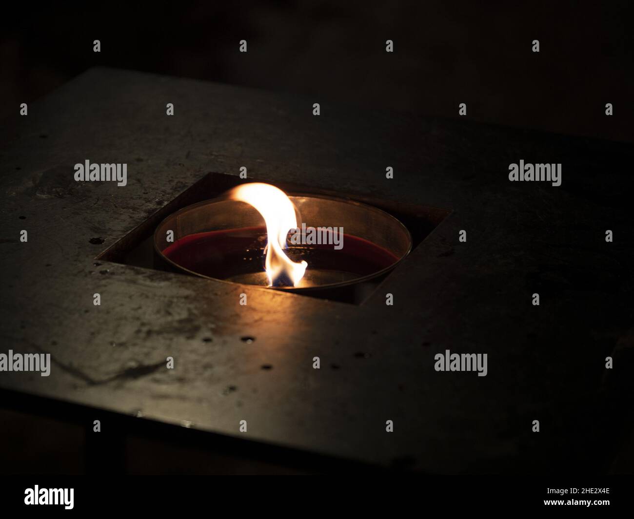 wax candle flame light on black background Stock Photo - Alamy