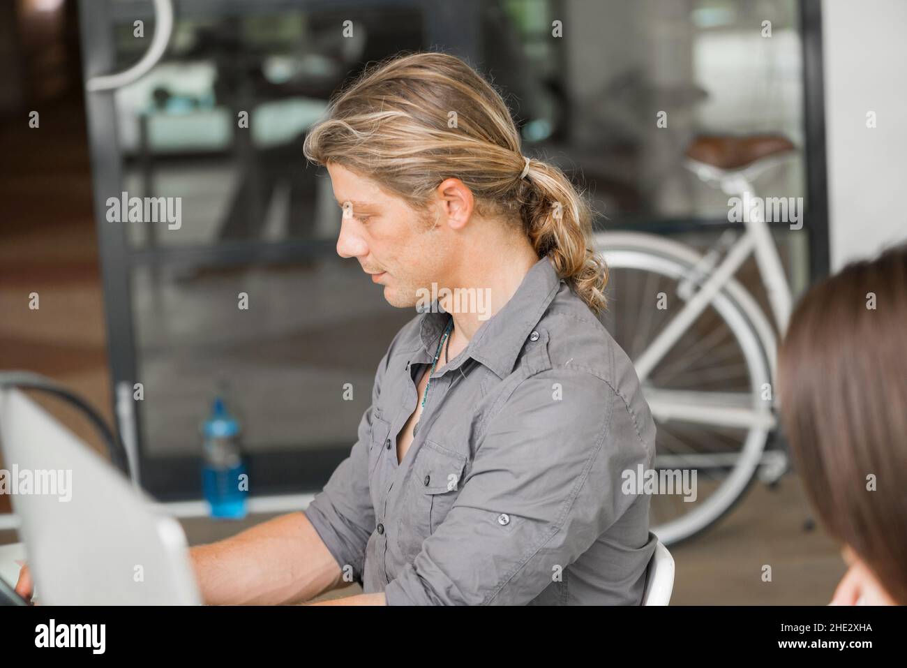 Handsome guy at computer work Stock Photo - Alamy