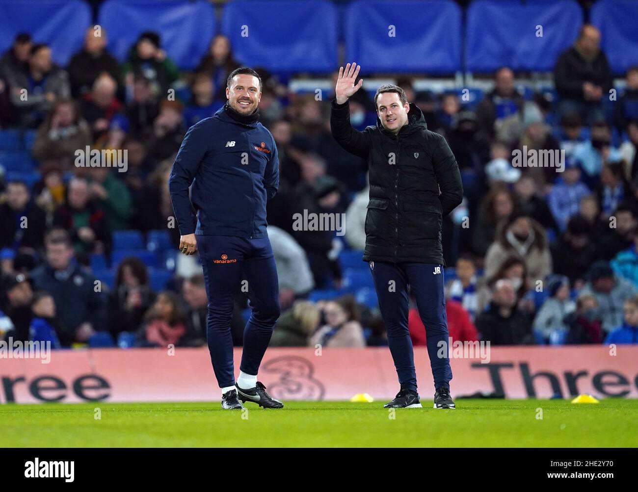 Chesterfield manager James Rowe (right) waves to fans as he talks to ...