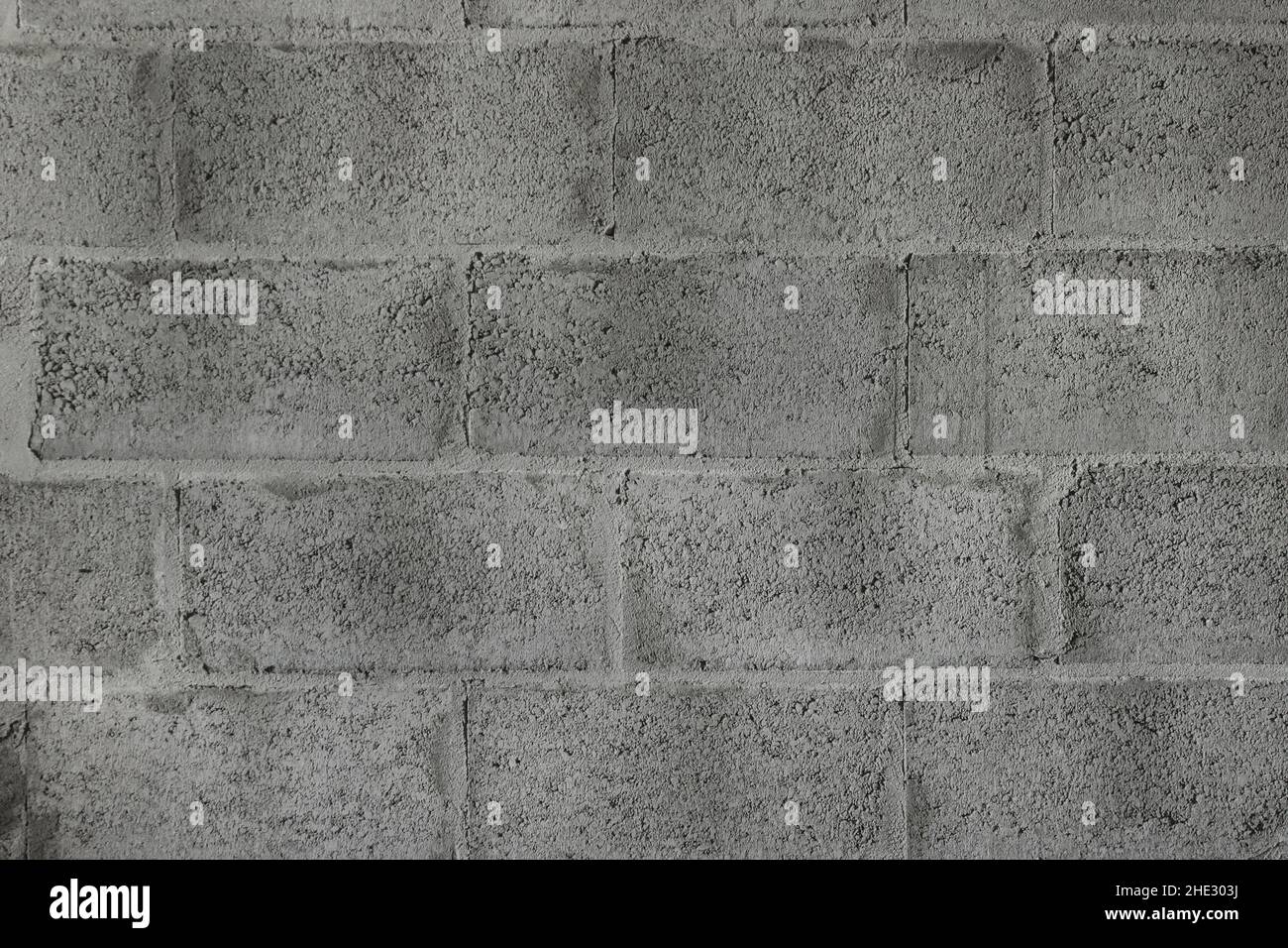 Wall of gray blocks as background Stock Photo - Alamy