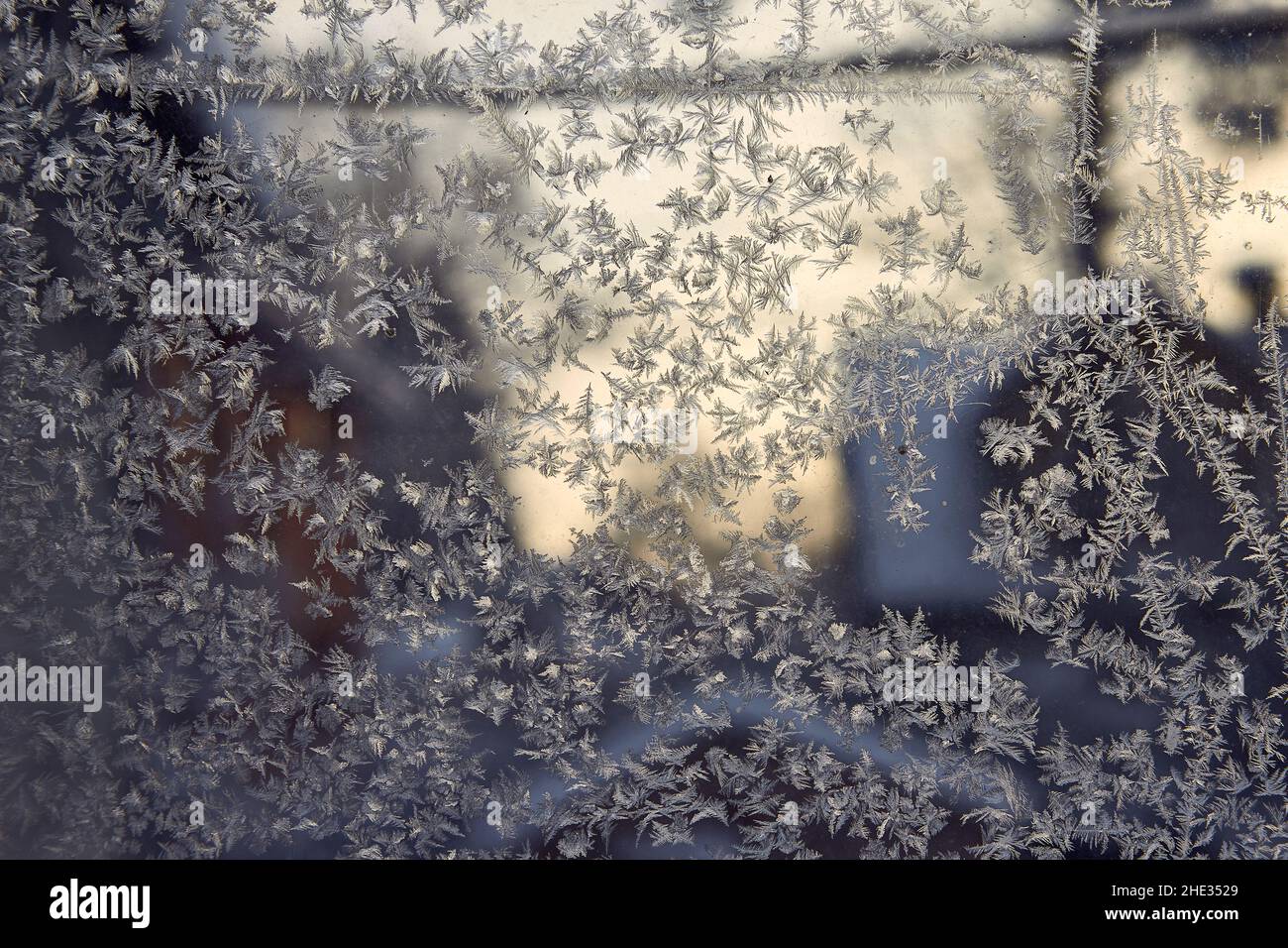 Winter frost pattern on a window in the country Stock Photo - Alamy