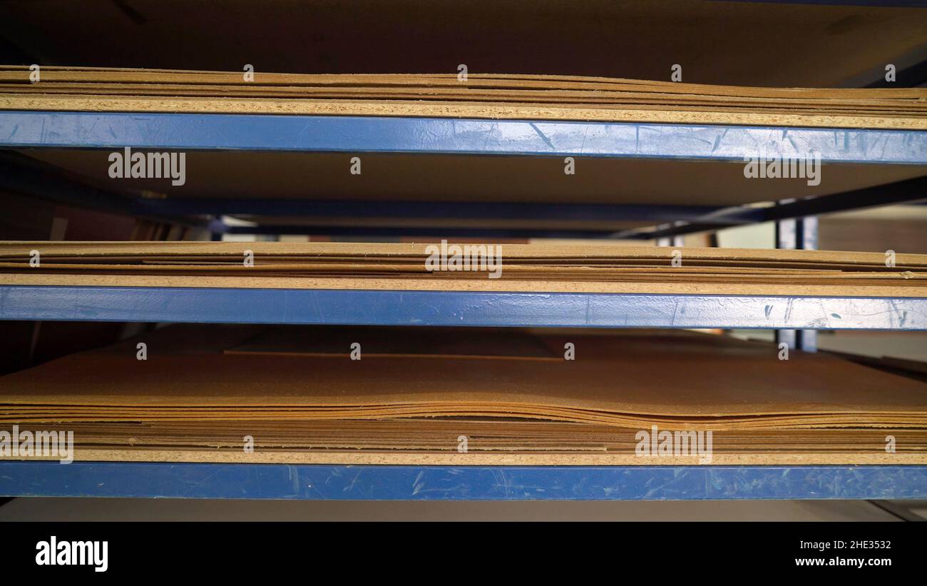Shelves with material for furniture production. Wood for the ...