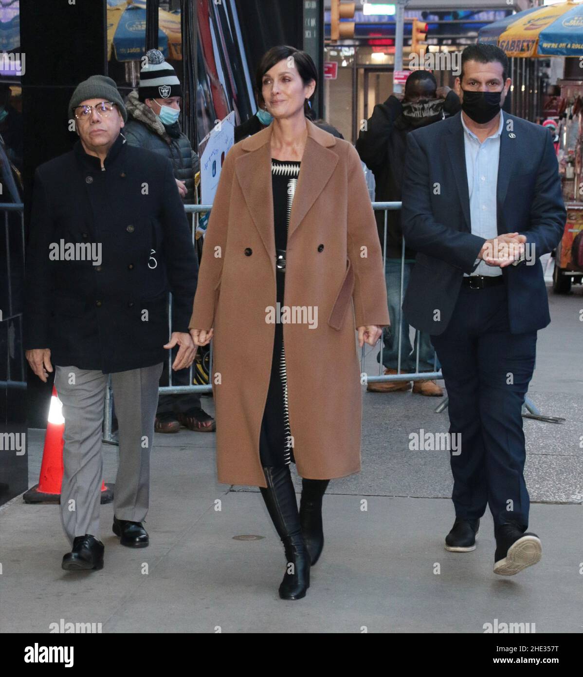 New York - NY - 20211214 Maggie Gyllenhaal and Carrie Anne Moss arrive ...