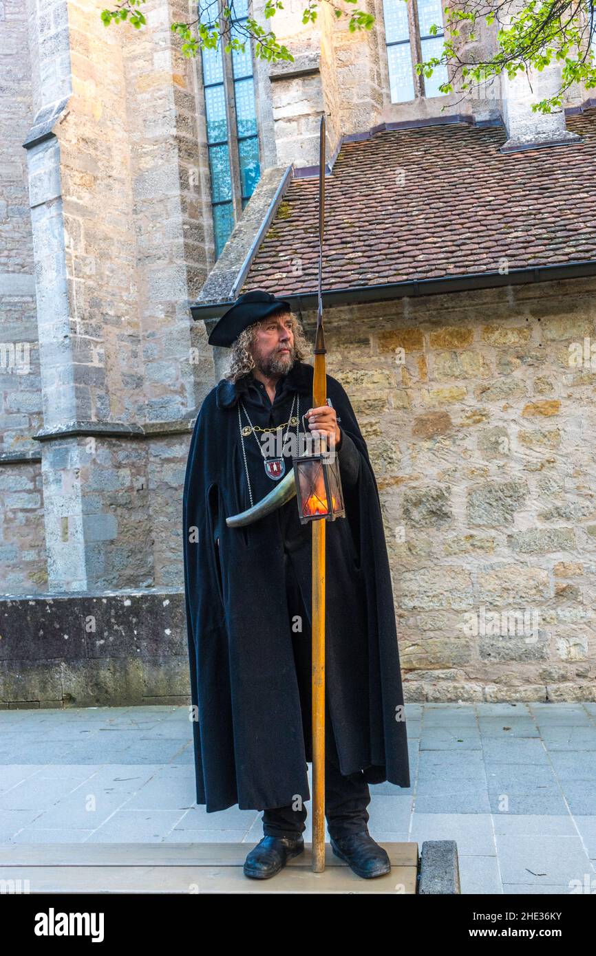 Vertical shot of The night watchman tour in Rothenburg, Germany Stock ...
