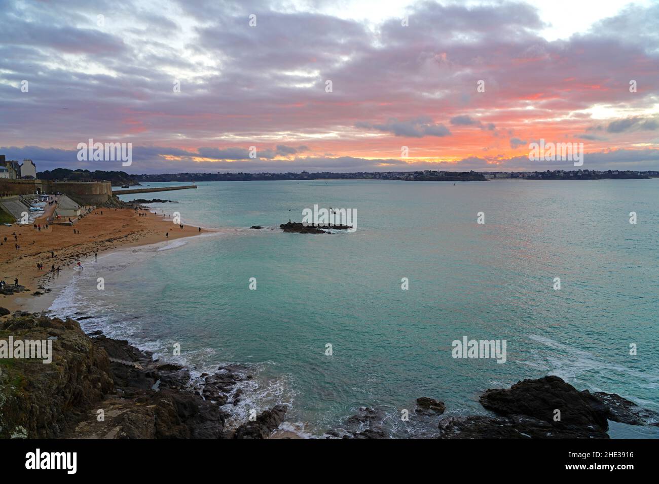 Colorful sunset sky in winter over the Atlantic Ocean in Saint Malo ...
