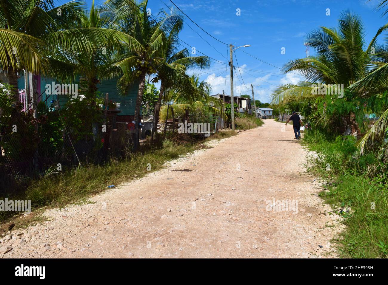 A local neighborhood with an unpaved street in Belize City, Belize ...