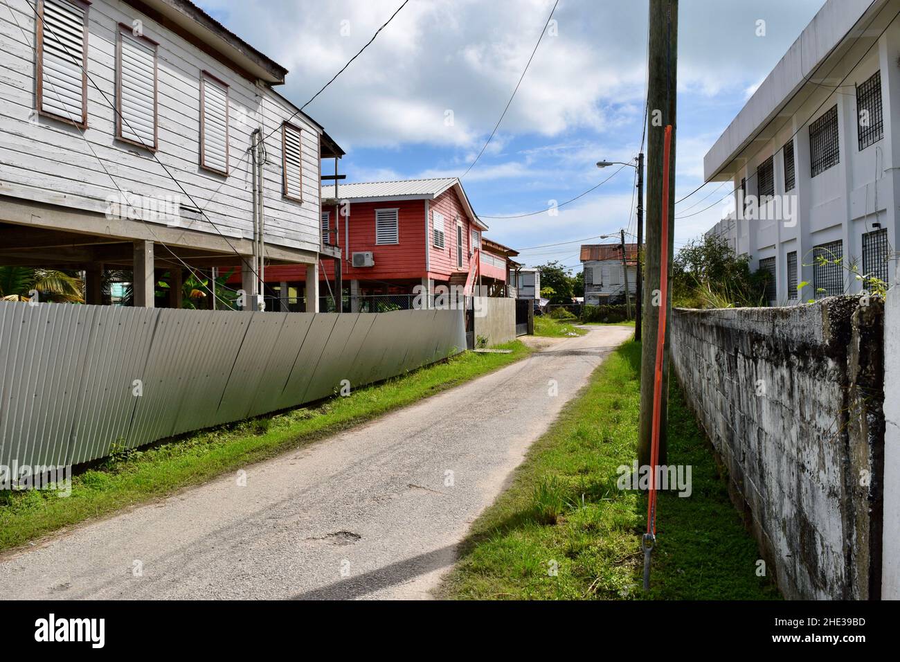 An alleyway in a neighborhood of Belize City, Belize Stock Photo - Alamy