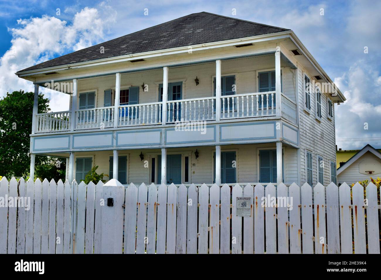 A view of the front and side of a restored colonial architecture ...