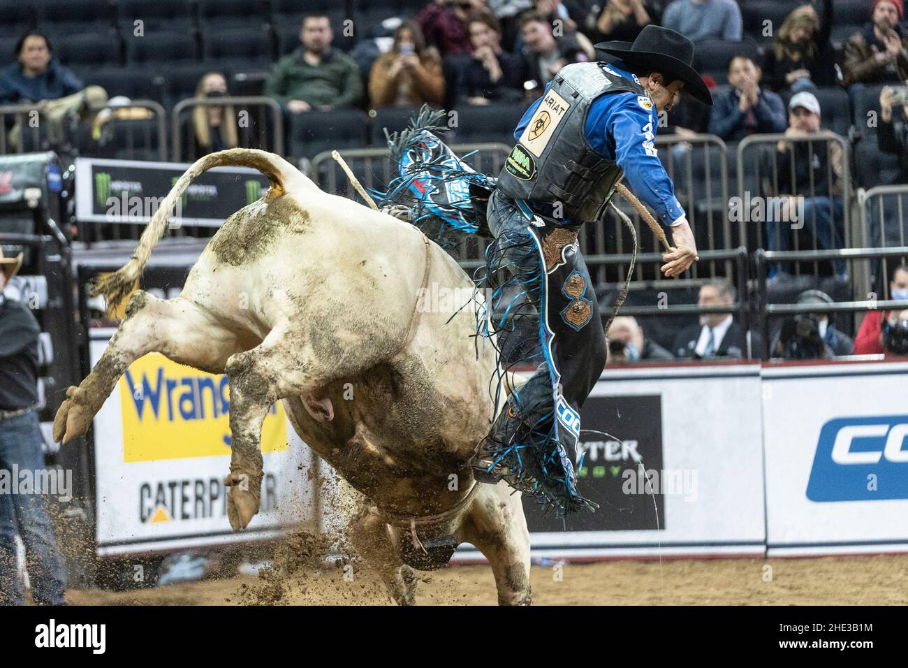 Joao Ricardo Vieira of Itatinga, Brazil rides a bull during PBR Unleash ...