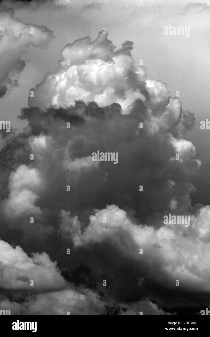 Darkening cumulus clouds form Black and White Stock Photos & Images - Alamy