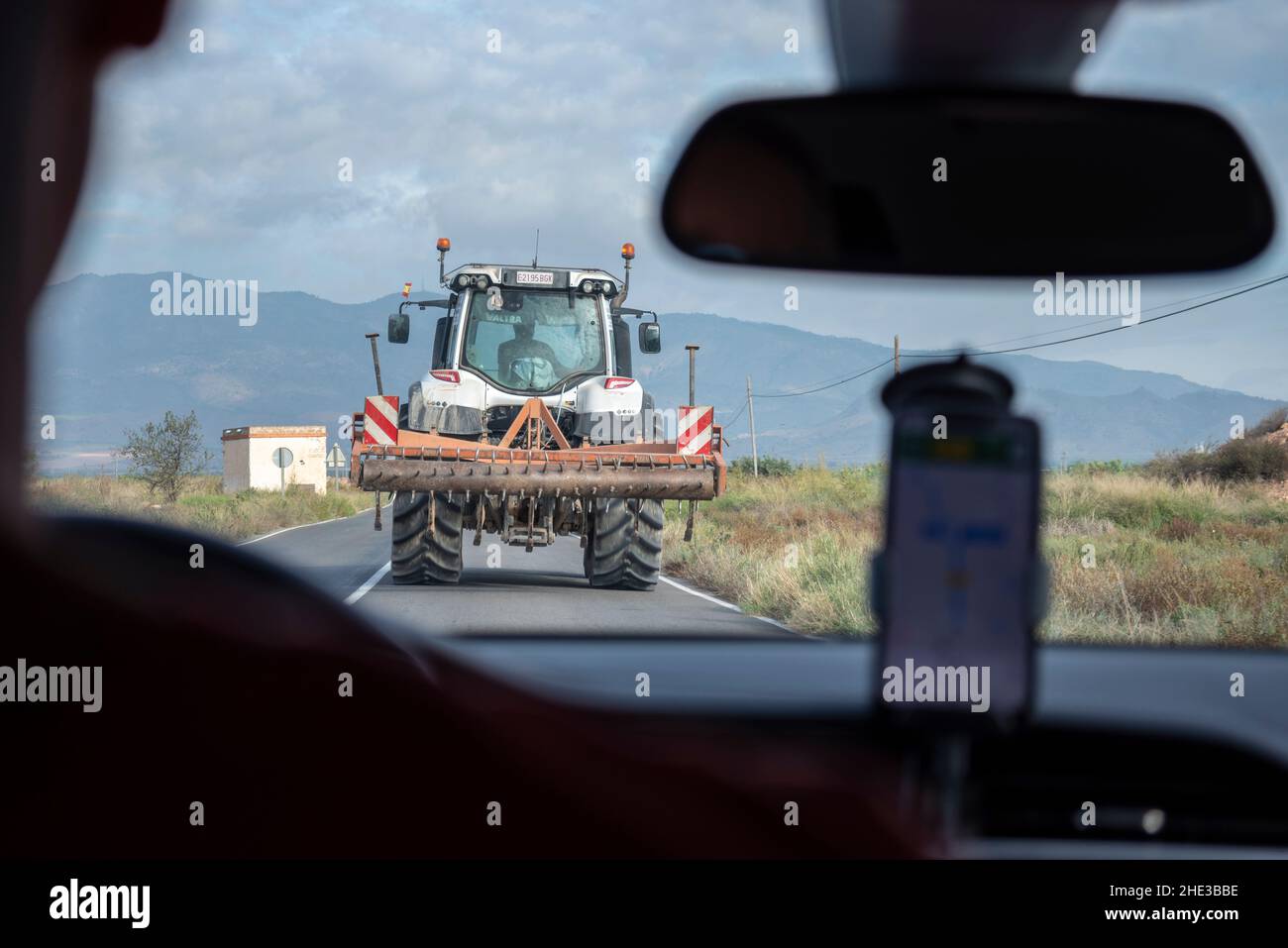 Car behind tractor hi-res stock photography and images - Alamy
