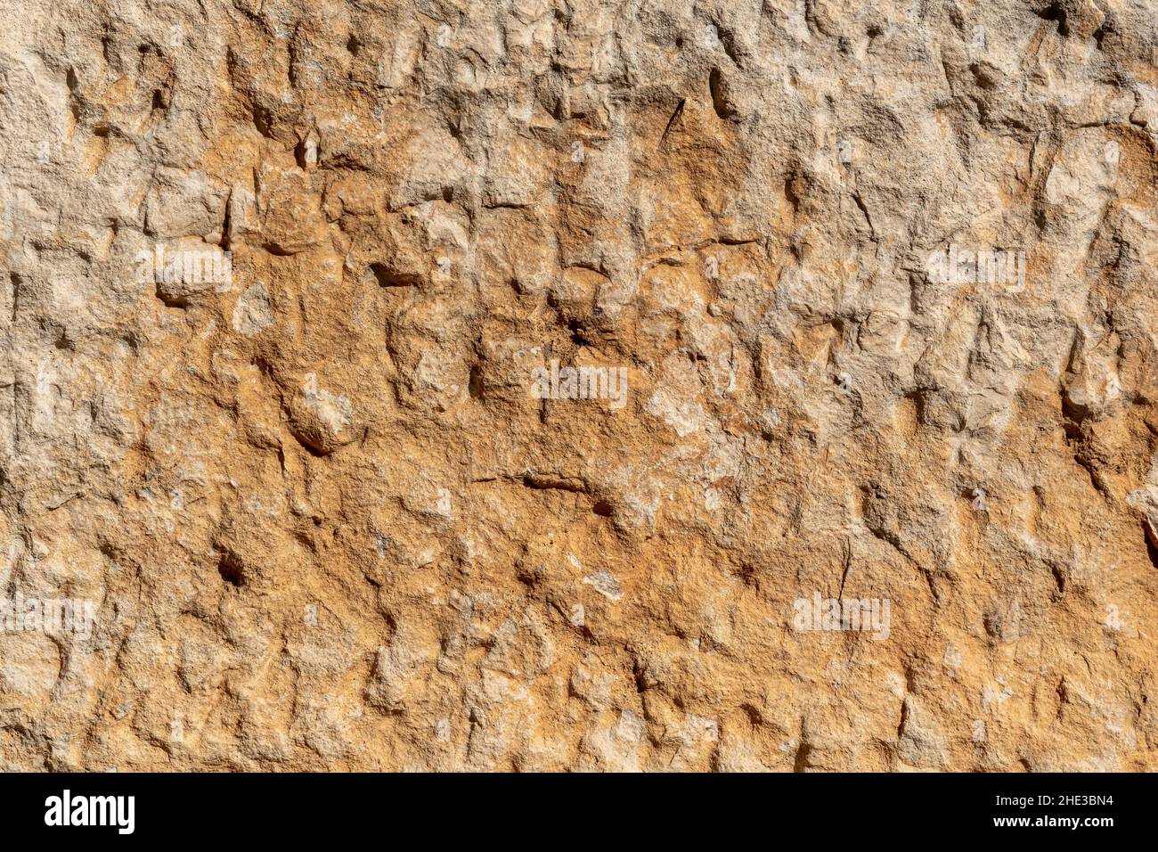 texture of a natural roughly cut stone of some ancient building Stock ...