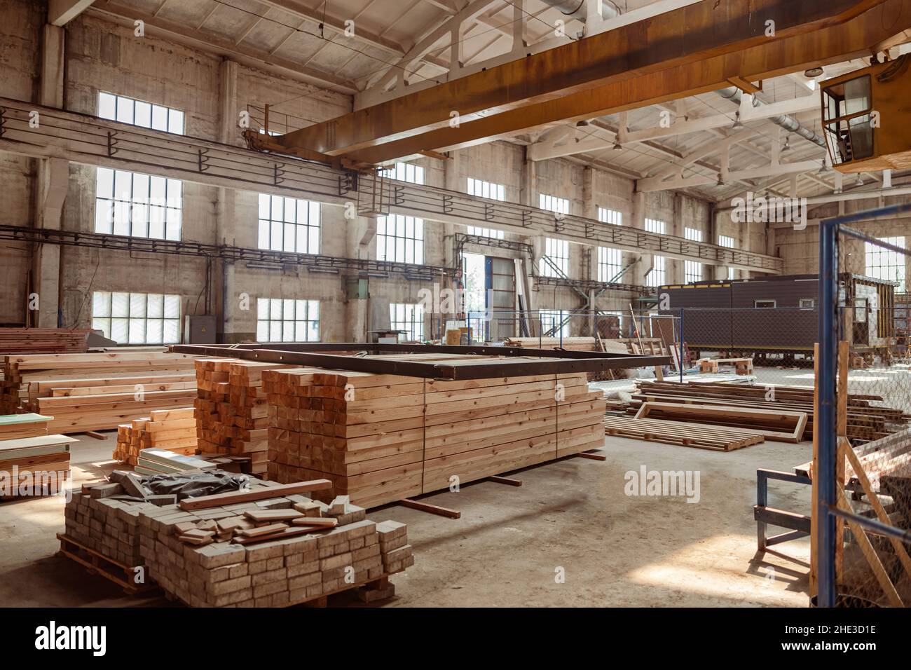 Wooden planks and bricks in building under construction Stock Photo - Alamy