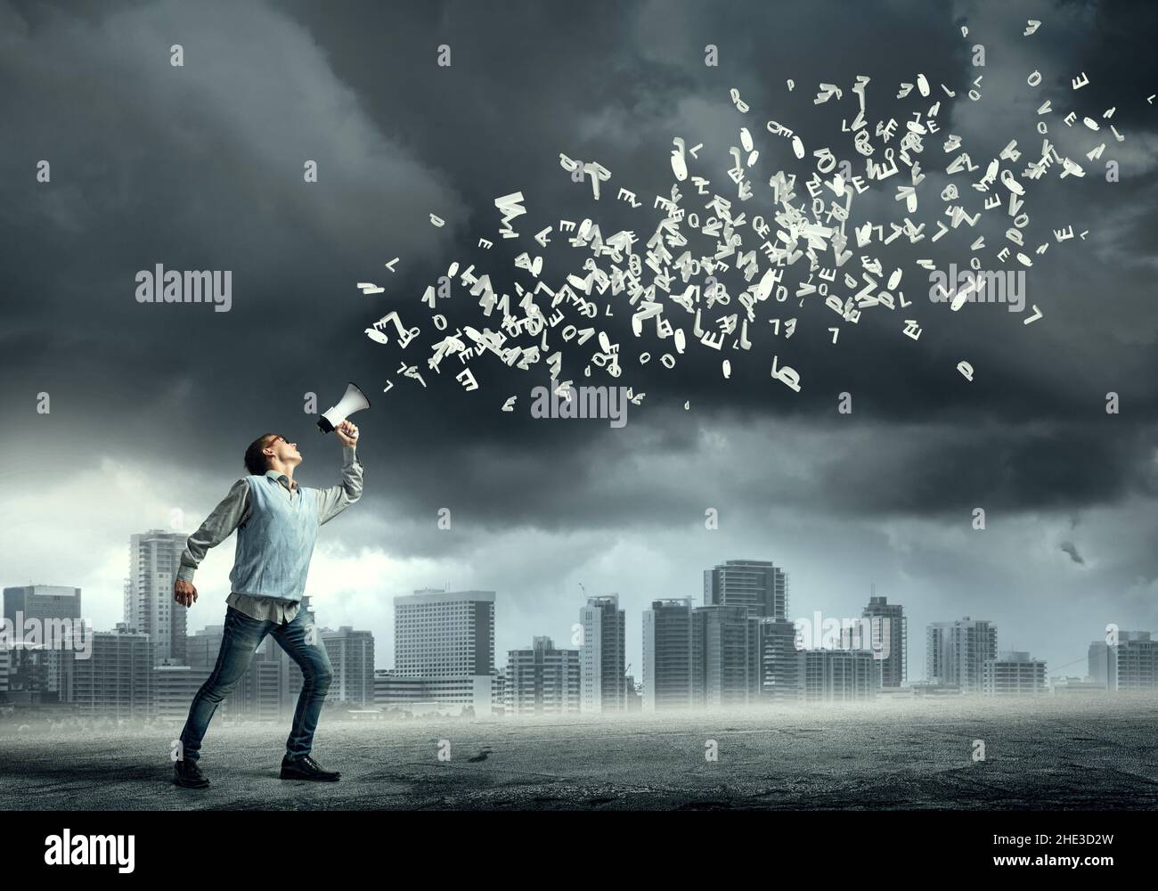 Boy with megaphone Stock Photo - Alamy