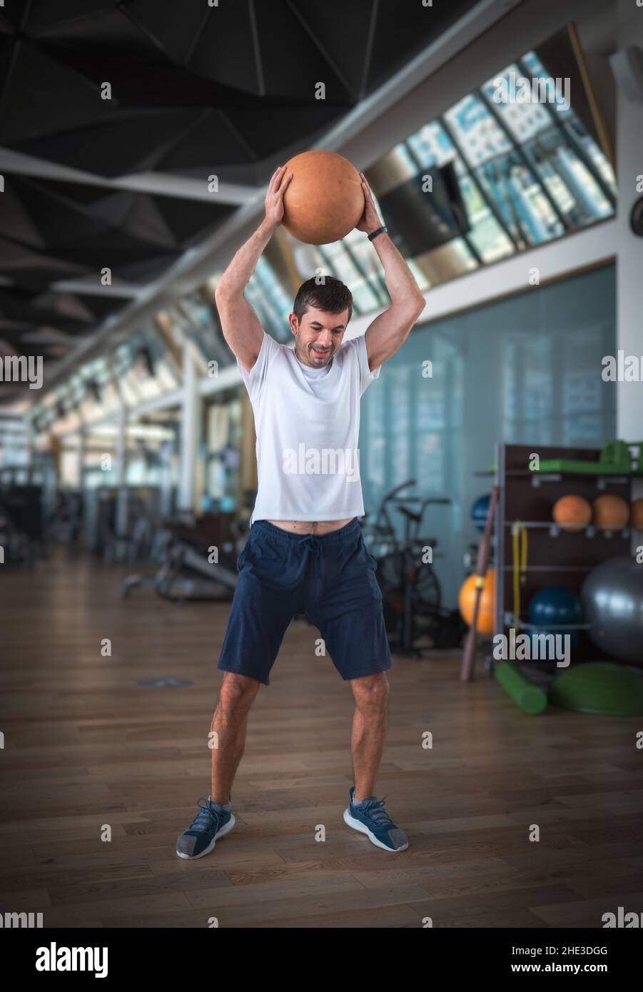 Handsome men exercising in gym hi-res stock photography and images - Alamy