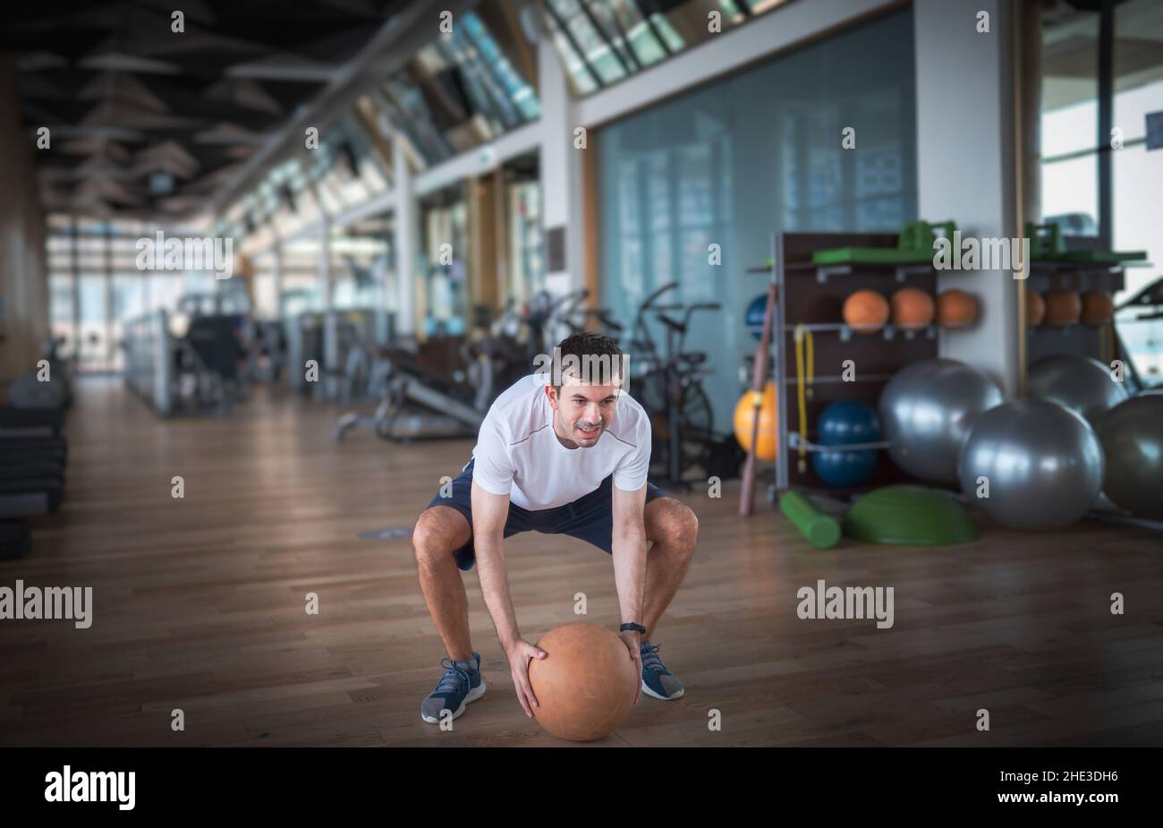 Handsome men exercising in gym hi-res stock photography and images - Alamy