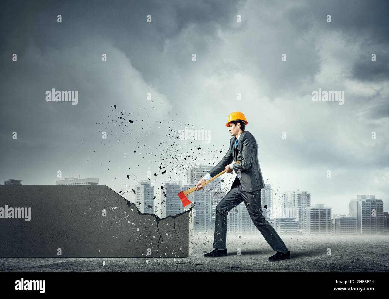 Engineer man break wall Stock Photo - Alamy