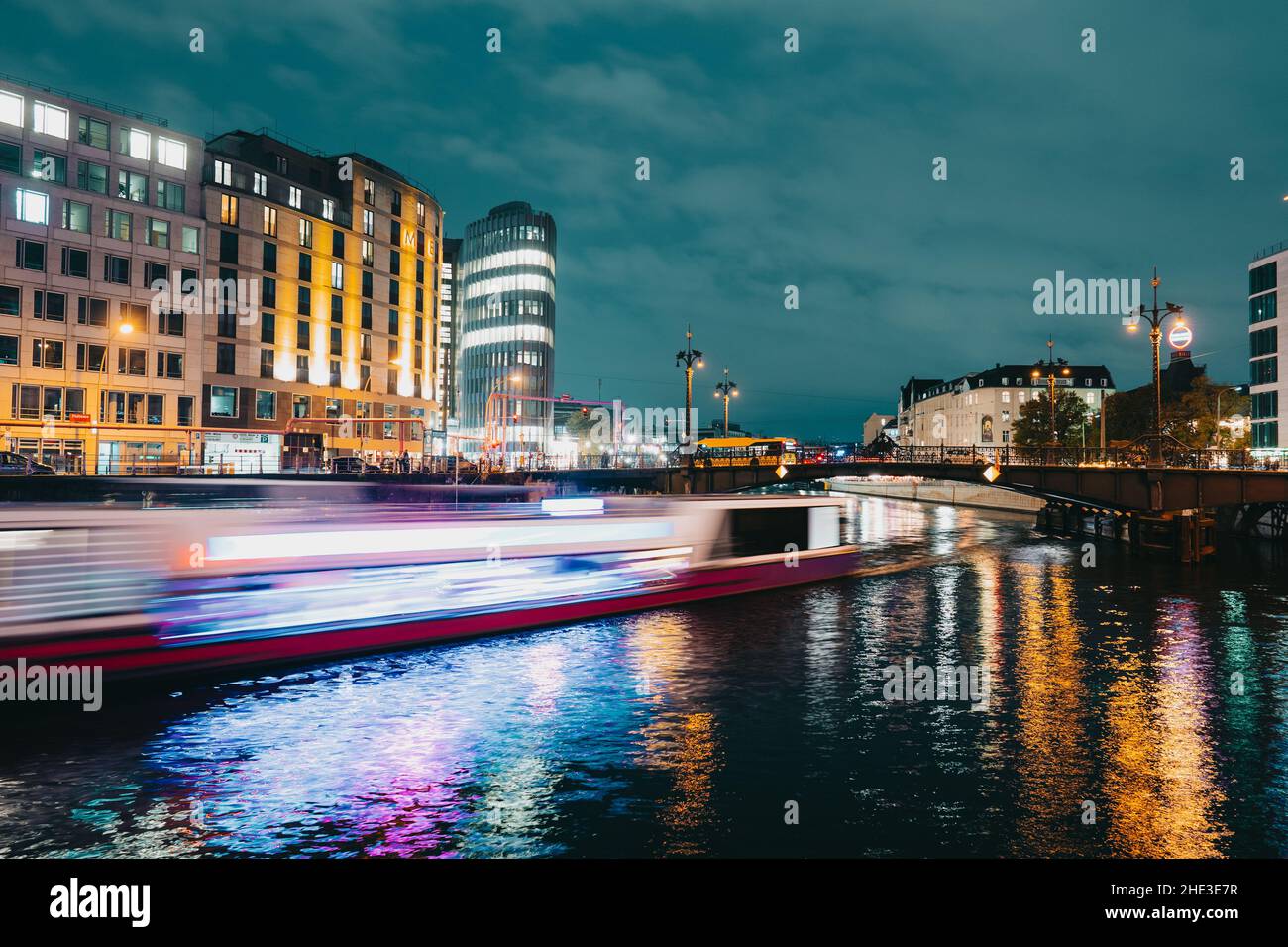 October 2021 - Berlin, Germany. Night view to historic busy street ...