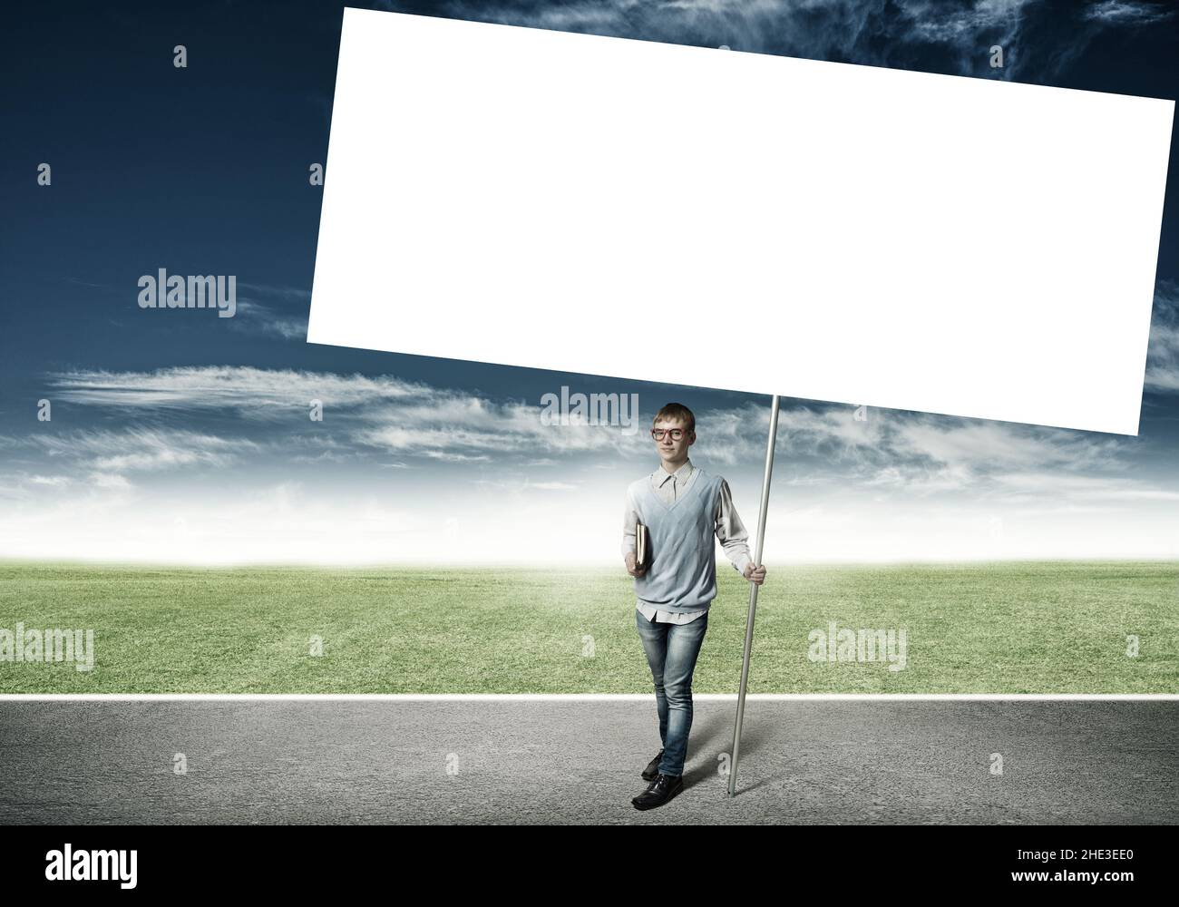 Boy with placard Stock Photo - Alamy