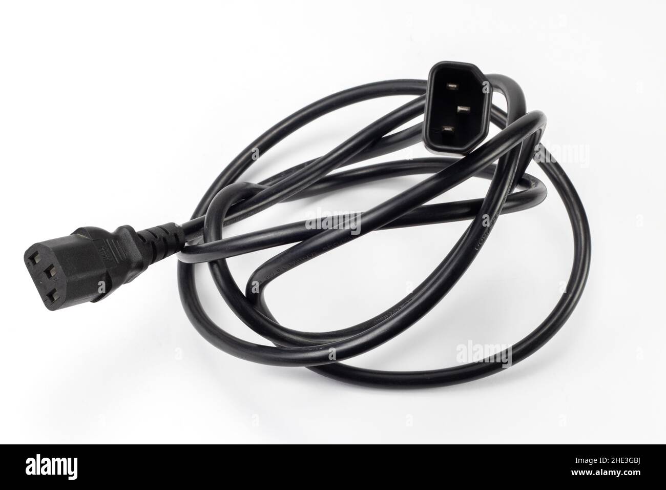Male and female three pin power cable. Black plastic appliance ...