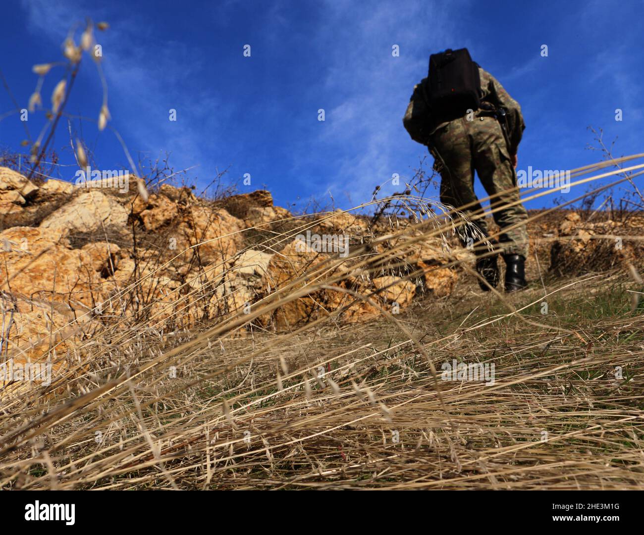 Turkish soldier, the background with his black bag on his back. Turkish ...