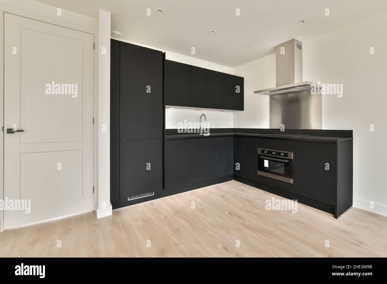 Interior of empty home kitchen with contemporary appliances Stock Photo ...