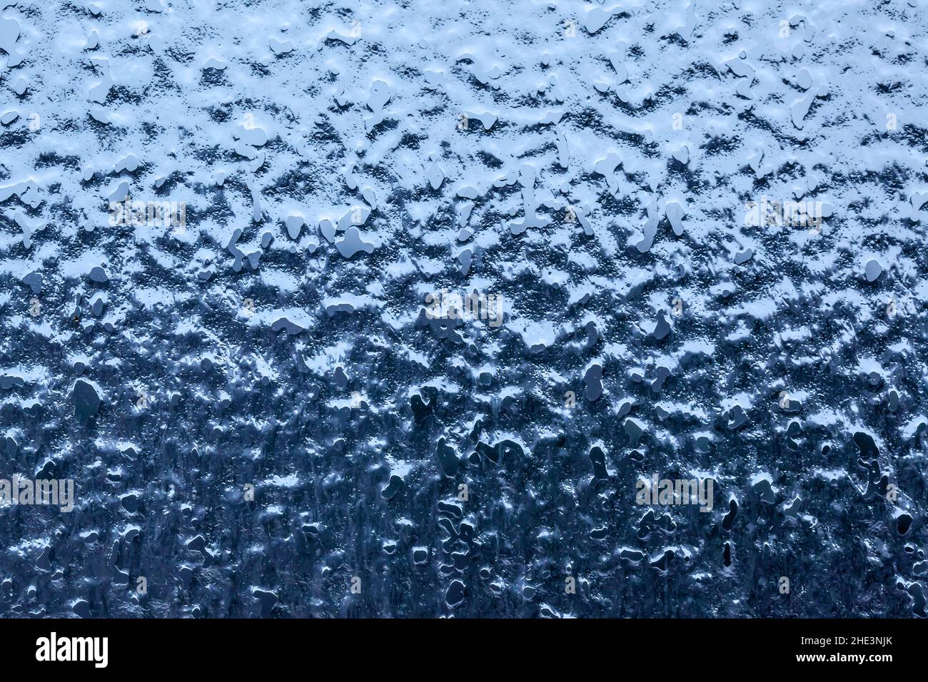 Ice-covered window glass close-up, may be usad as background Stock ...