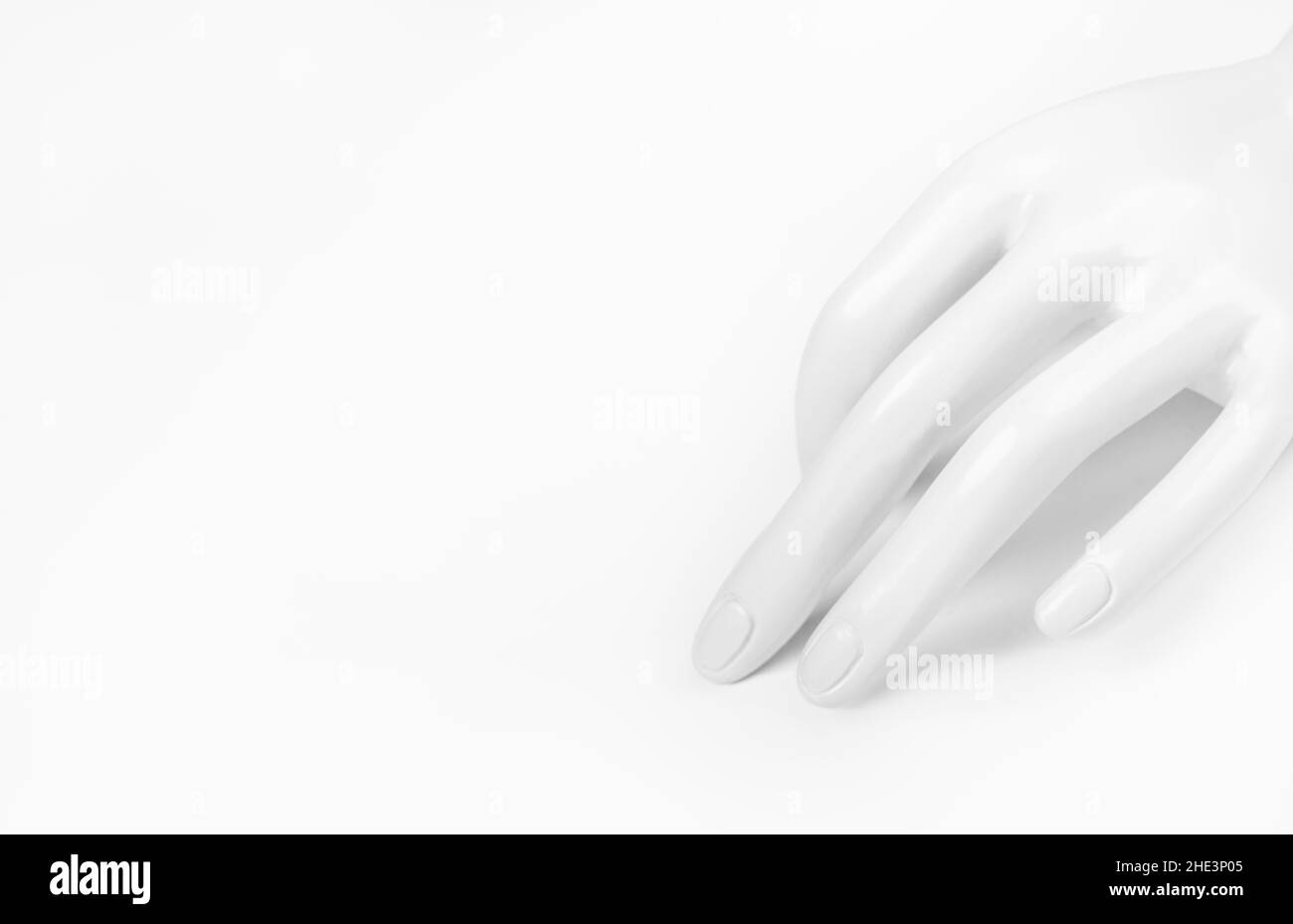 ladies' plastic white hand for rings on white background Stock Photo ...