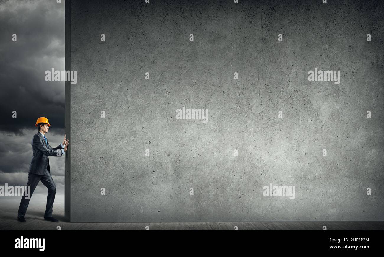 Construction man and cement banner Stock Photo - Alamy