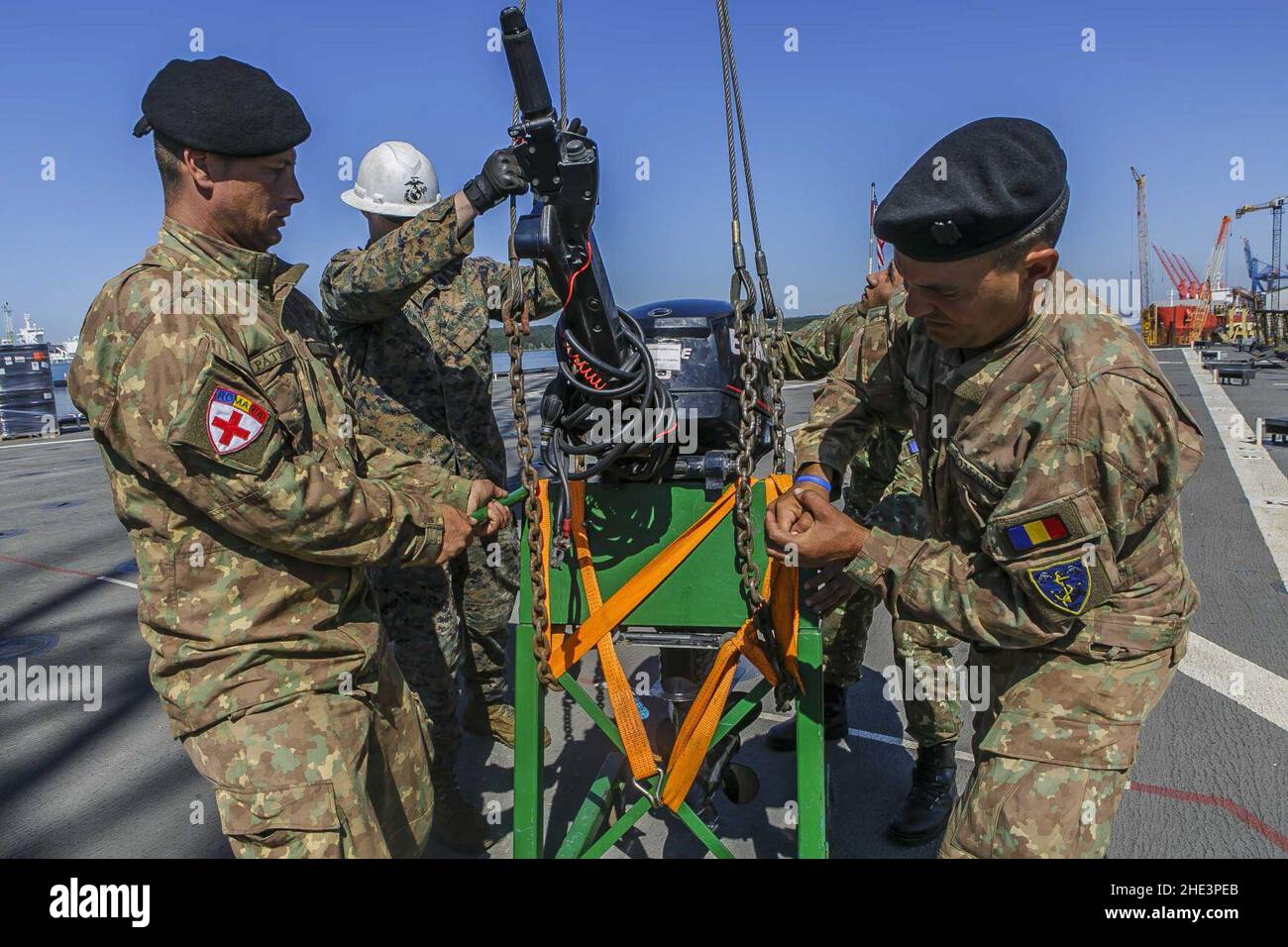 Romanian 307th Naval Infantry Battalion embarks with 26th MEU Marines ...