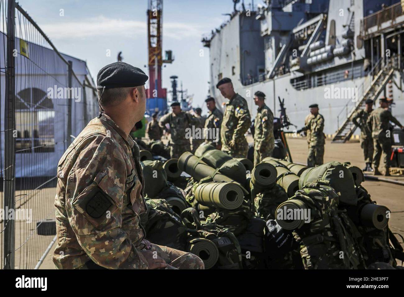 Romanian 307th Naval Infantry Battalion embarks with 26th MEU Marines ...