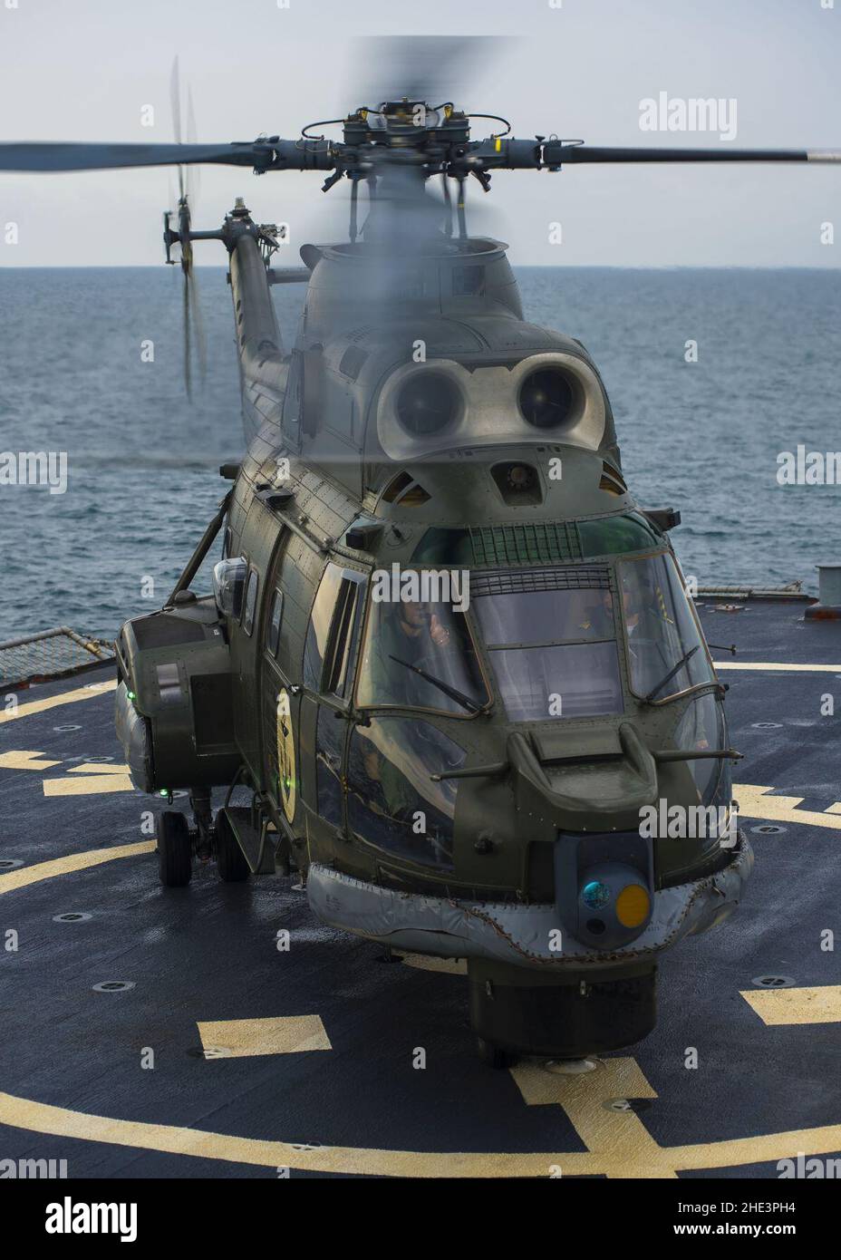 Romanian Navy IAR-330 medium helicopter conducts flight operations ...
