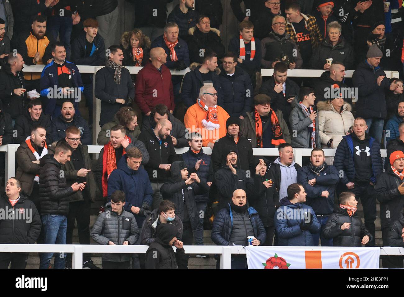 Blackpool fans during the game Stock Photo - Alamy